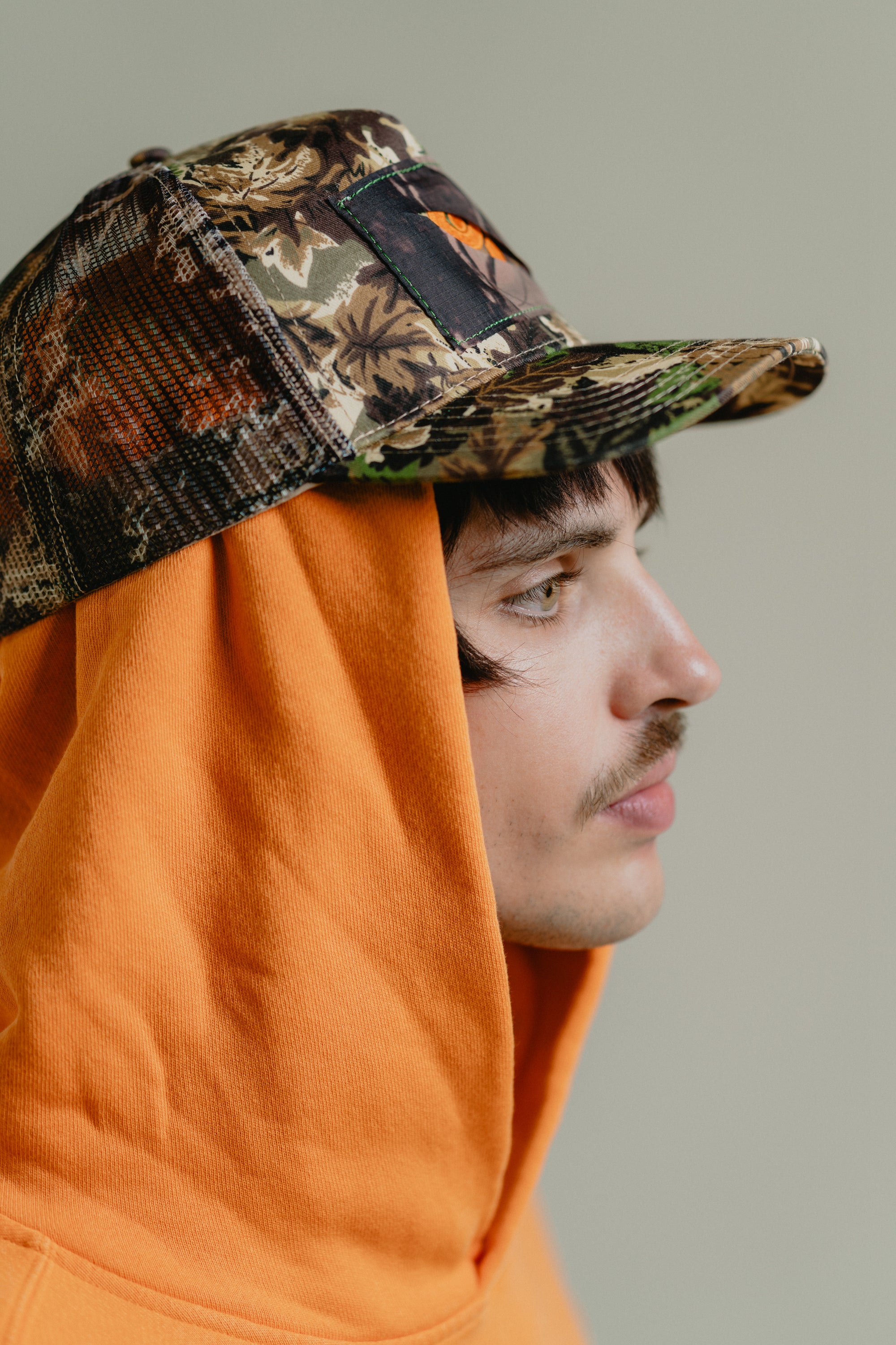 IN-STOCK | PEEK-A-BOO CAMO TRUCKER HAT – Engulf The Label